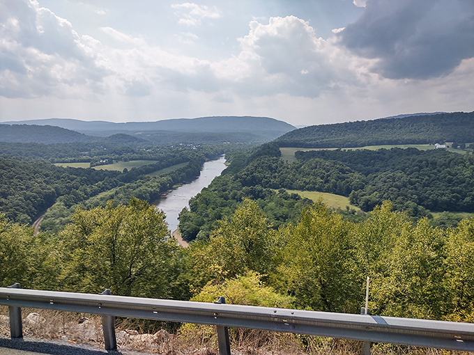 The Potomac River Valley unfolds in breathtaking panorama, reminding visitors that Berkeley Springs' natural splendor extends far beyond its famous waters.