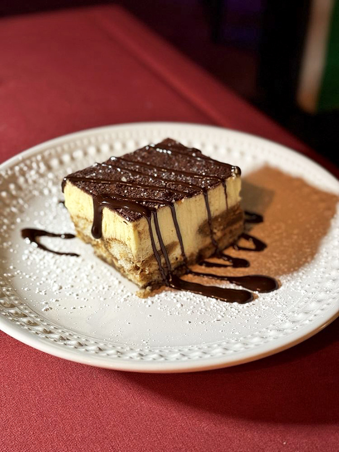 Tiramisu that strikes the perfect balance between coffee and cream—architectural in presentation, cloud-like in each velvety spoonful.