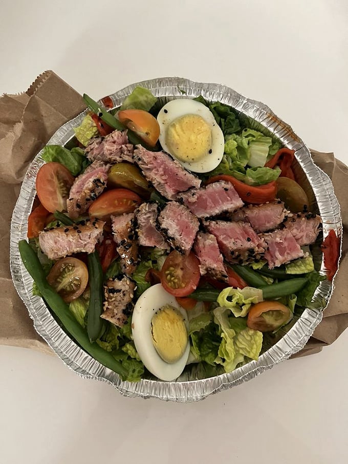 Rare tuna and fresh greens playing nicely together—proof that sometimes the healthiest option is also the most photogenic.