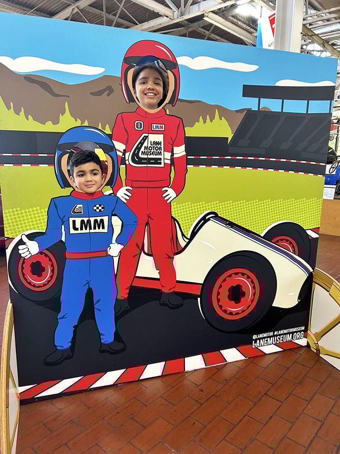 The museum's photo op wall lets kids imagine themselves as racing legends. Today's selfie spot, tomorrow's inspiration for automotive engineers.