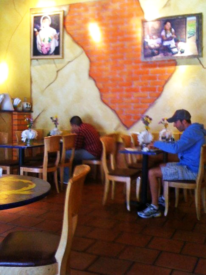 Even the walls tell stories here. Those diners aren't just eating lunch—they're participating in a culinary tradition that spans generations.