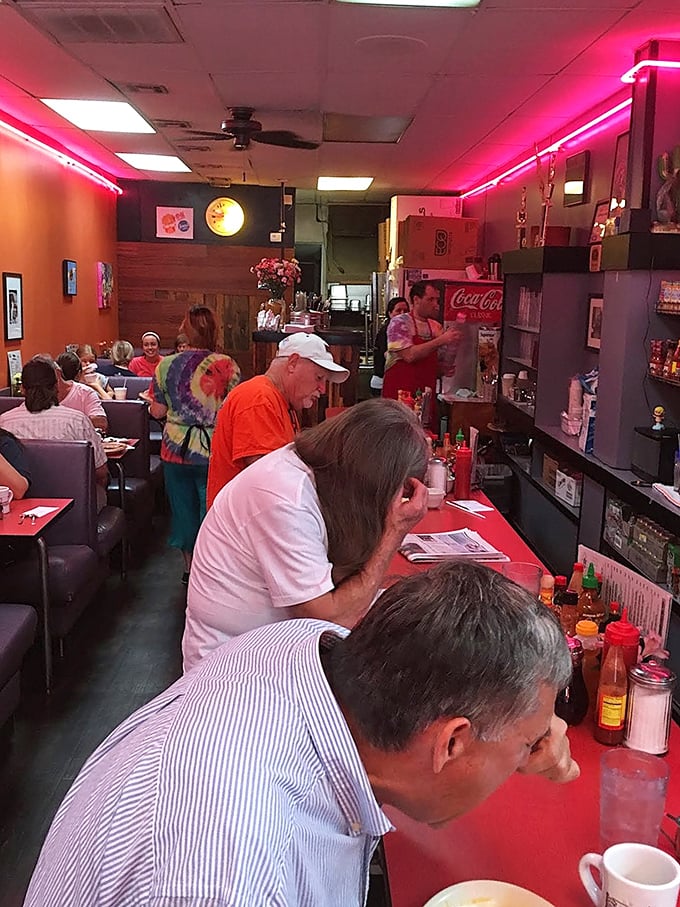 The counter seating—where strangers become temporary neighbors and everyone has an opinion on how the Sooners will do this season.