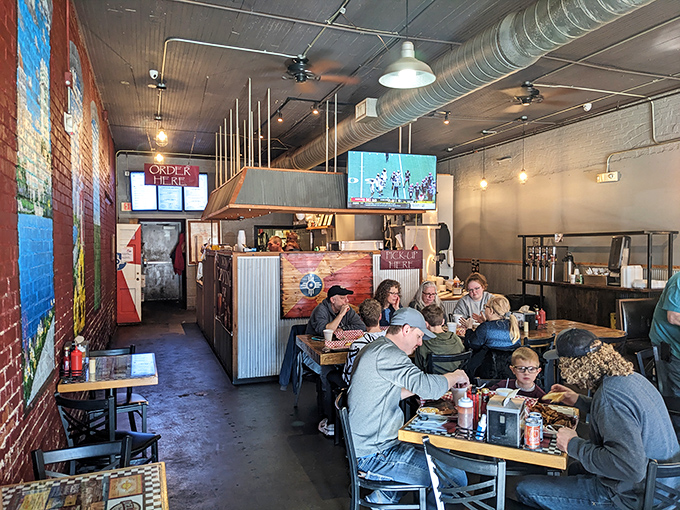The true measure of a barbecue joint: tables full of people too busy enjoying their food to talk. Silence never tasted so good.