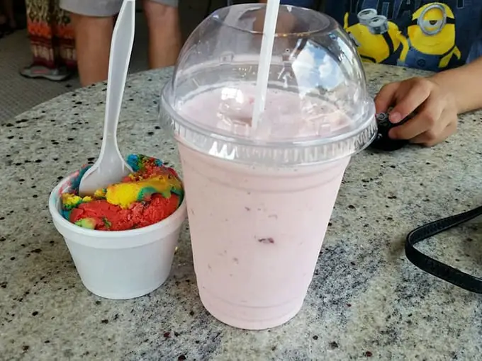 That strawberry shake isn't just pink—it's the color of childhood memories, served with a side of rainbow sprinkles because why grow up completely?