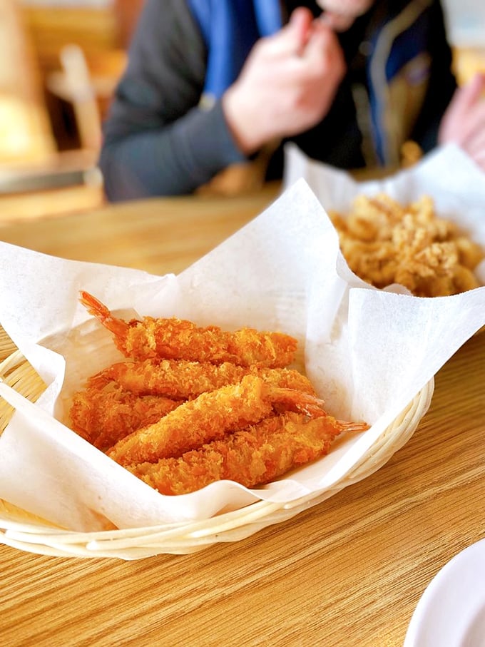 Tempura shrimp lined up like delicious soldiers ready to march straight into your heart. Crispy outside, tender within – nature's perfect design.