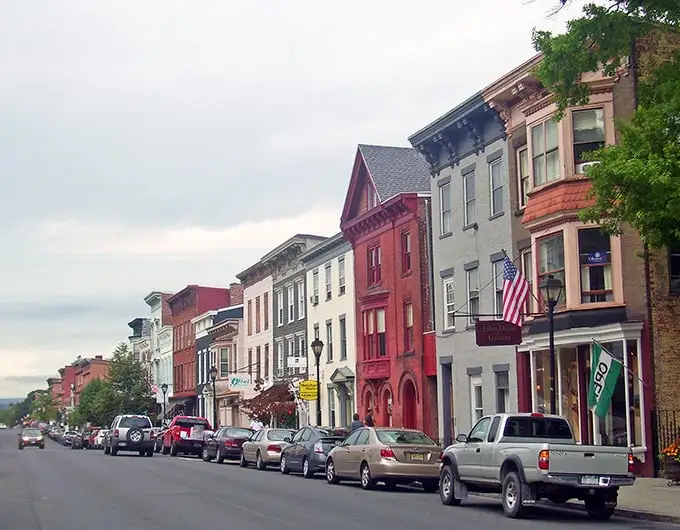 Colorful historic buildings line Hudson's streets, offering small-town charm with surprising affordability despite its growing popularity.