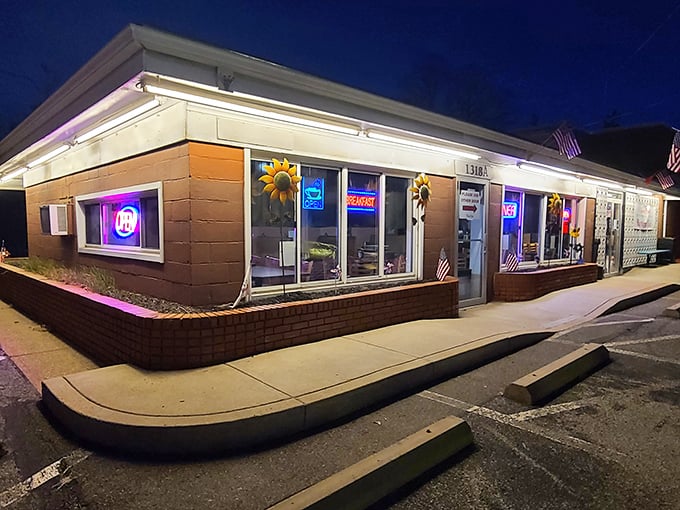 Jimis' Sunnyside Up Diner (evening): By night, the neon glow transforms this roadside spot into a beacon of late-night breakfast possibilities.