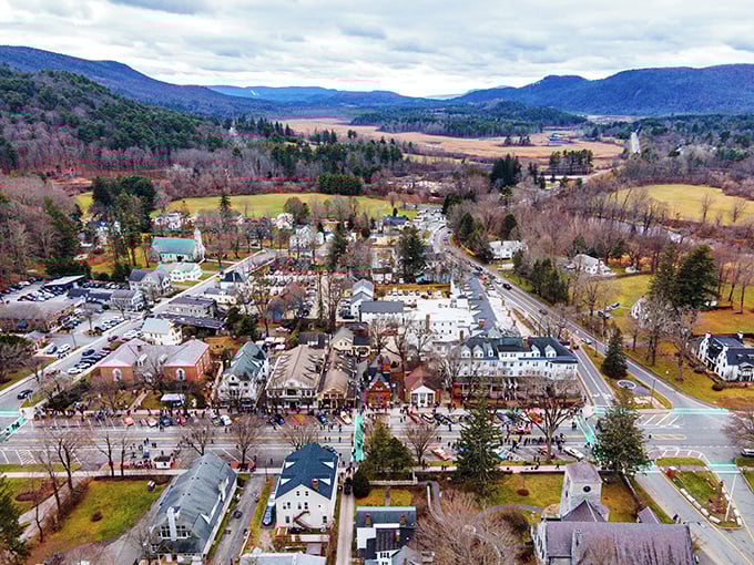 The mountains embrace this picturesque village, creating a postcard-perfect scene that changes gloriously with each season.