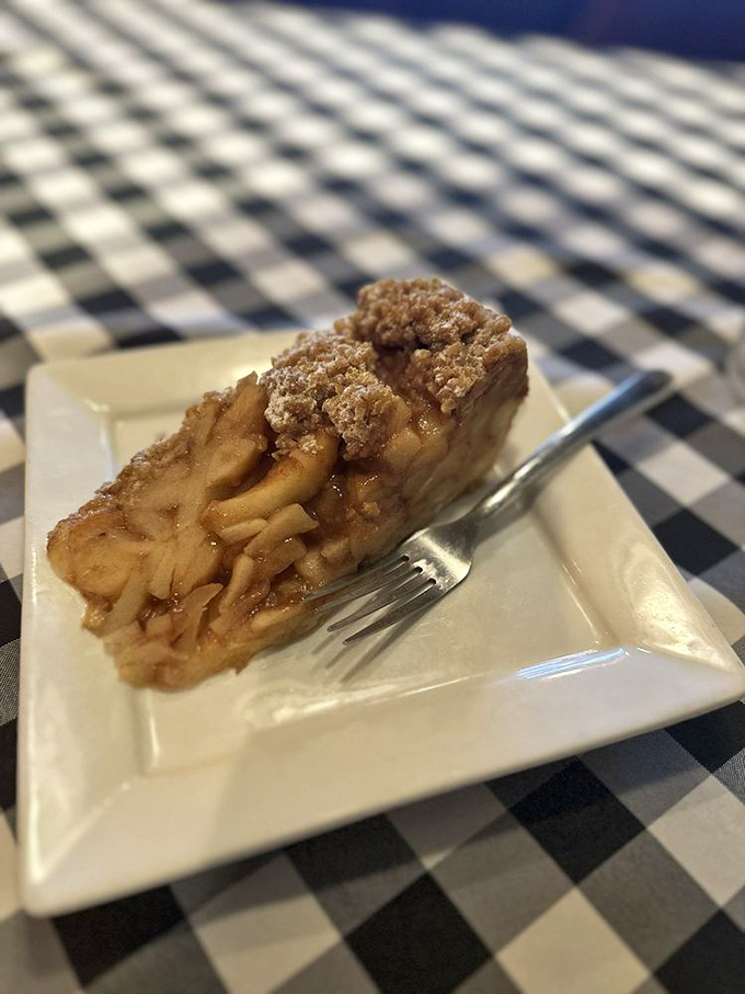 This apple crumble pie isn't just dessert—it's edible architecture with layers of warm spiced apples and buttery crumble that would make any Oma proud.