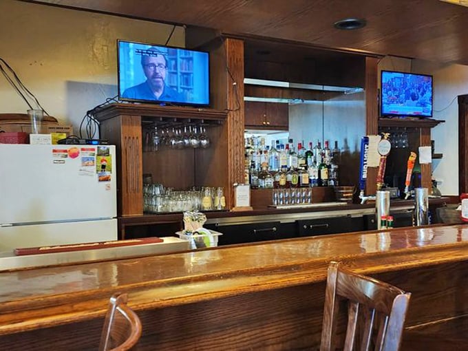 The bar area isn't trying to be trendy—it's trying to be exactly what it is: a reliable spot where everybody might actually know your name.