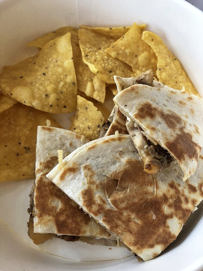 The quesadilla and chips—a dynamic duo that belongs in the comfort food hall of fame alongside peanut butter and jelly.