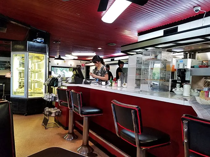 The counter—that hallowed ground where solo diners find community and servers perform the sacred ritual of infinite coffee refills.
