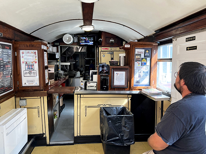 From this vantage point, you can watch the entire operation—part short-order cooking, part choreographed dance, all delicious results.