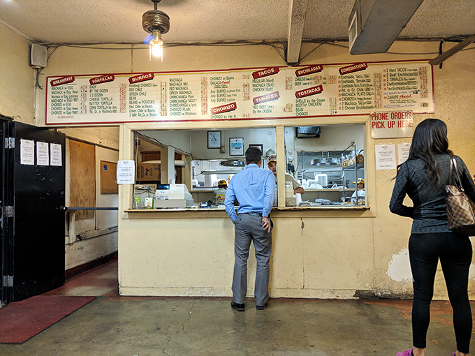 The ordering counter—where dreams begin and hunger ends. Notice the well-worn path to this hallowed spot of culinary transaction.