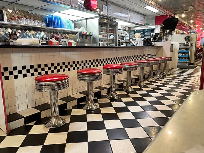 These chrome thrones aren't just seats—they're front-row tickets to the greatest show on earth: breakfast served all day.
