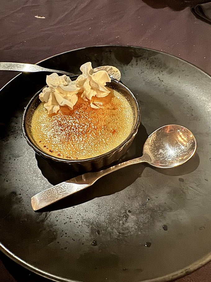 Crème brûlée with a crackling top that makes the most satisfying sound when tapped. Dessert that demands a moment of respectful silence.