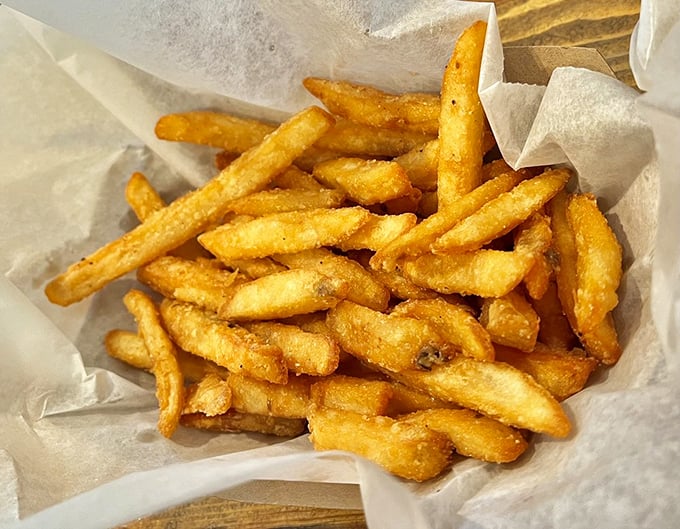 These aren't just fries—they're golden tickets to flavor town, crispy on the outside, fluffy inside, and impossible to stop eating.