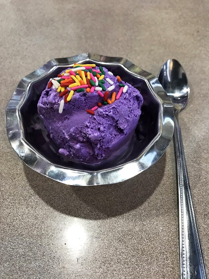 Purple ice cream with rainbow sprinkles—because sometimes your inner eight-year-old deserves to order dessert for the grown-up you.