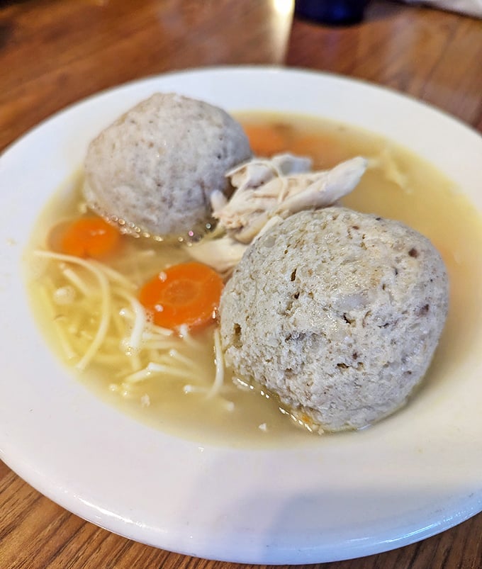 Matzo ball soup – Jewish penicillin that could cure anything from a common cold to existential dread. Those fluffy dumplings are floating happiness.