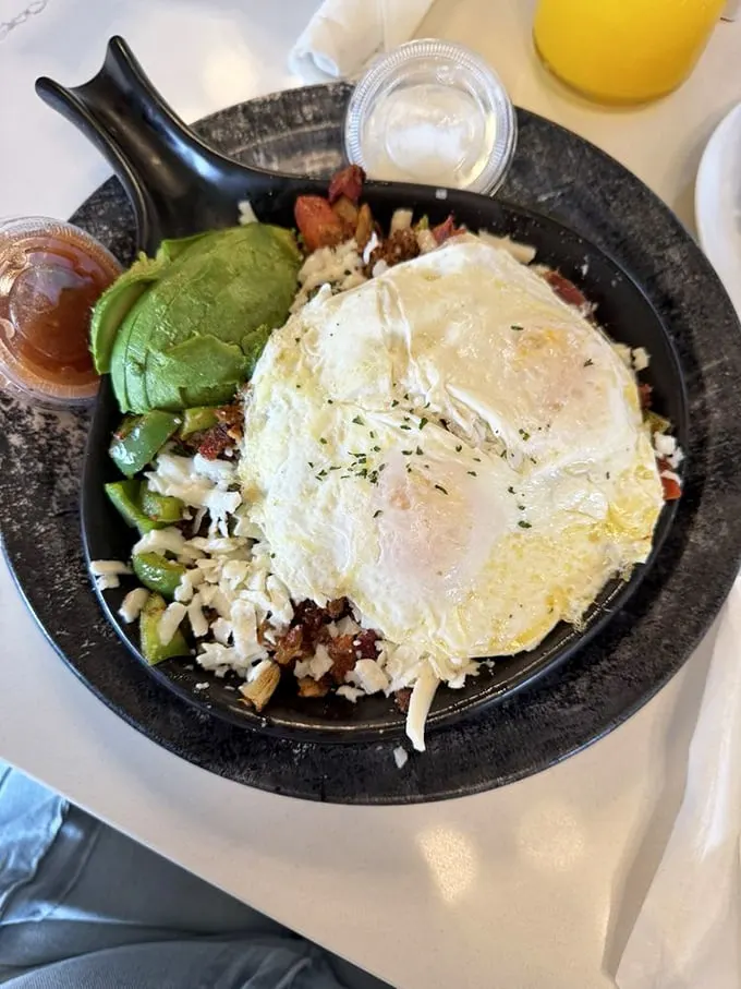 When breakfast takes a trip south of the border – eggs crown a fiesta of ingredients in this hearty skillet that demands to be devoured.