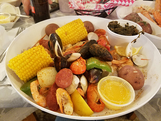 This seafood boil isn't just dinner—it's an event. Corn, potatoes, sausage, and seafood having the most delicious pool party imaginable.