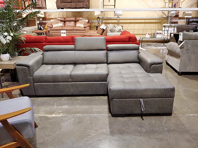 That gray sectional with studded details isn't just a sofa – it's the future center of family movie nights and impromptu naps.