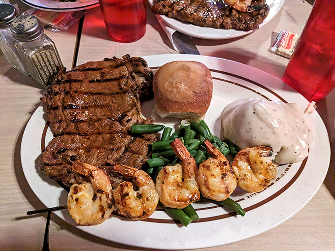 The surf meets the turf in rural Kansas, proving that good ideas—like adding grilled shrimp to a perfect steak—know no coastal boundaries.