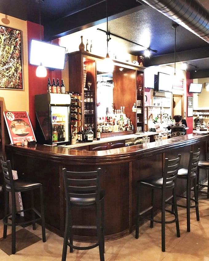 The bar at Yarusso's—where strangers become friends and friends become family, all over glasses of wine and tales of great meals past.