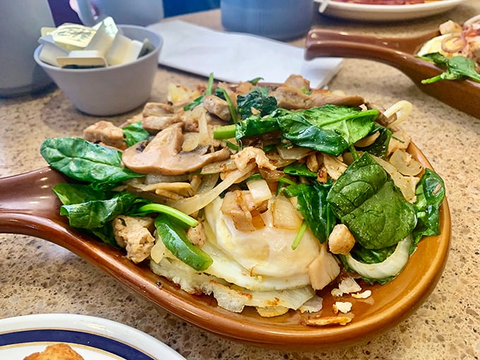 This skillet doesn't just feed you—it adopts you. Potatoes, ham, vegetables, and gravy coming together like the world's most delicious family reunion.
