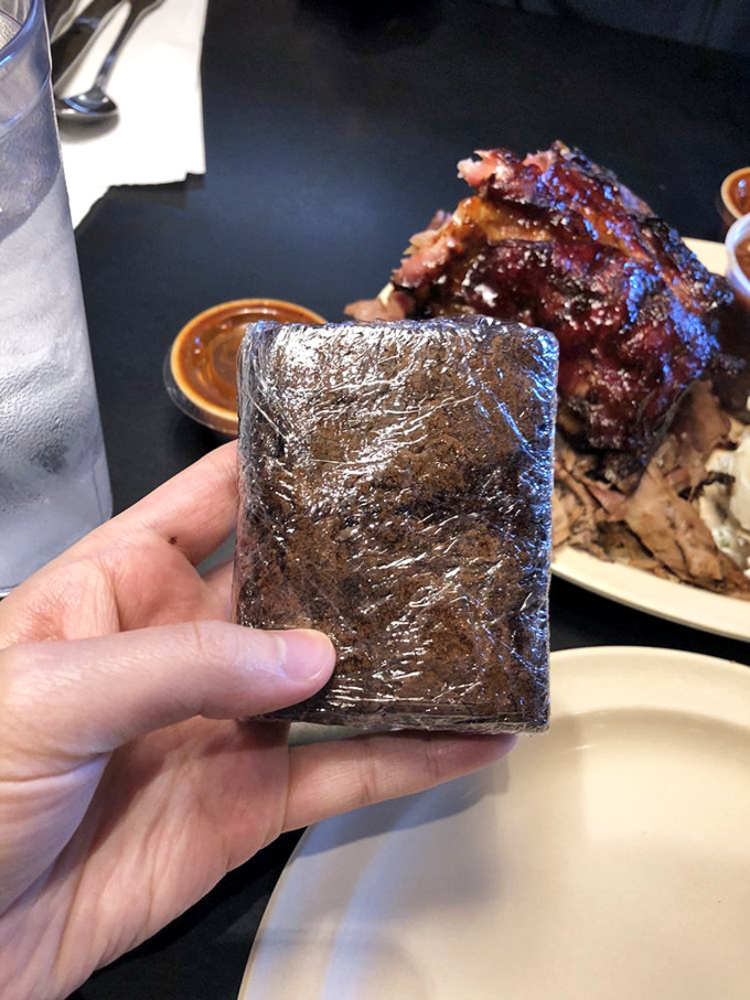 That mysterious wrapped package holds the final chapter of your BBQ odyssey – a brownie waiting to provide the sweet finale.