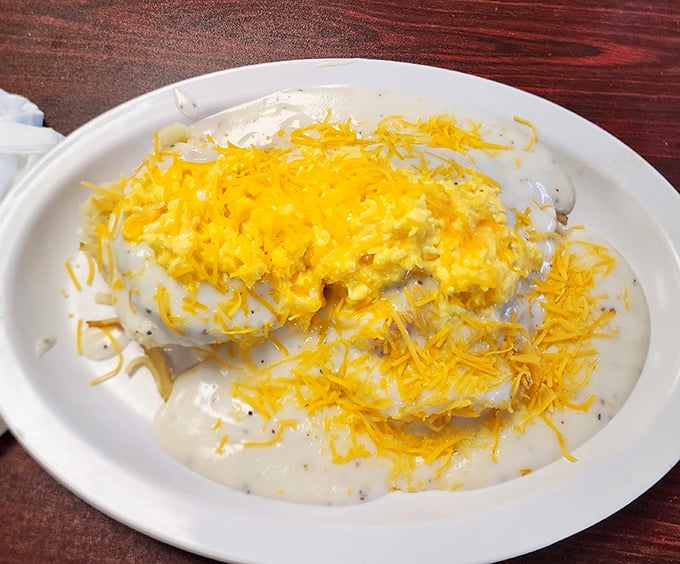 This isn't just cheese and eggs—it's a golden-topped mountain of morning comfort that makes hitting the snooze button seem like a crime.