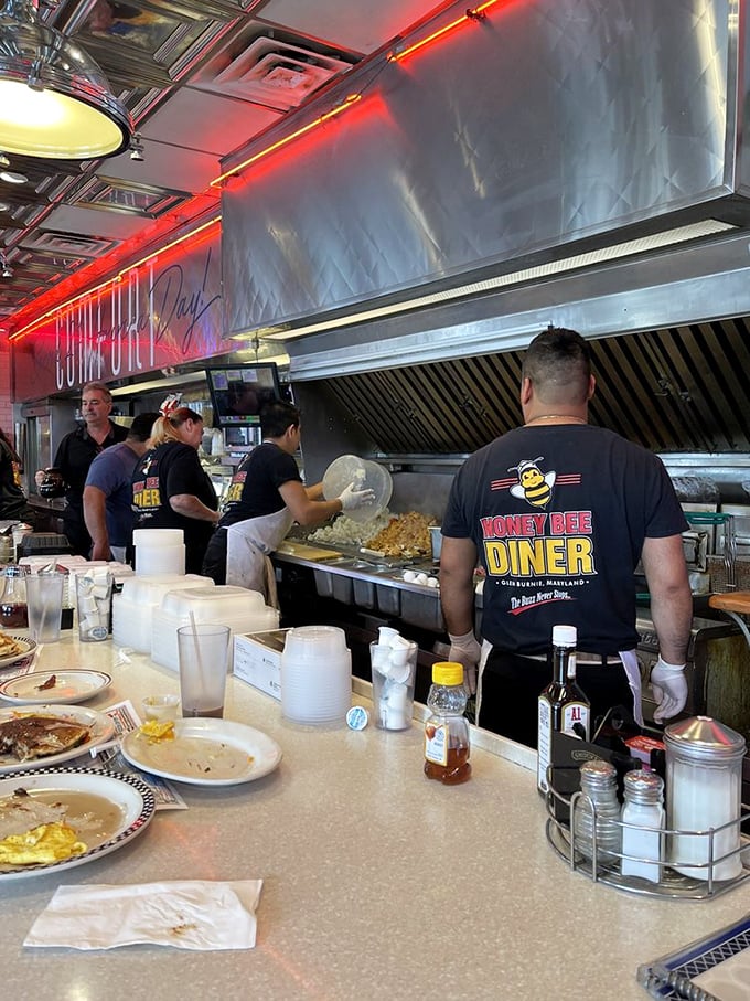 Where the magic happens! The open kitchen design lets you witness the choreographed chaos that transforms simple ingredients into diner masterpieces.