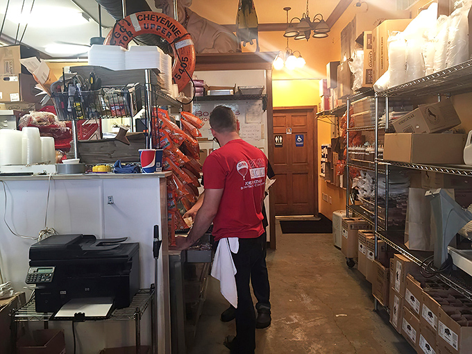 Behind the scenes, the staff moves with practiced precision - barbecue might be slow food, but these folks know hungry customers won't wait.