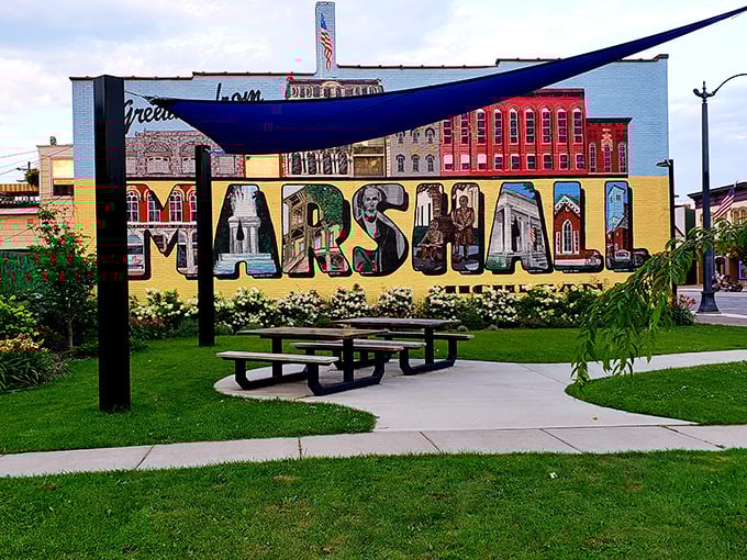 This vibrant mural doesn't just spell Marshall—it illustrates why this town matters, with each letter containing snippets of the community's collective story.