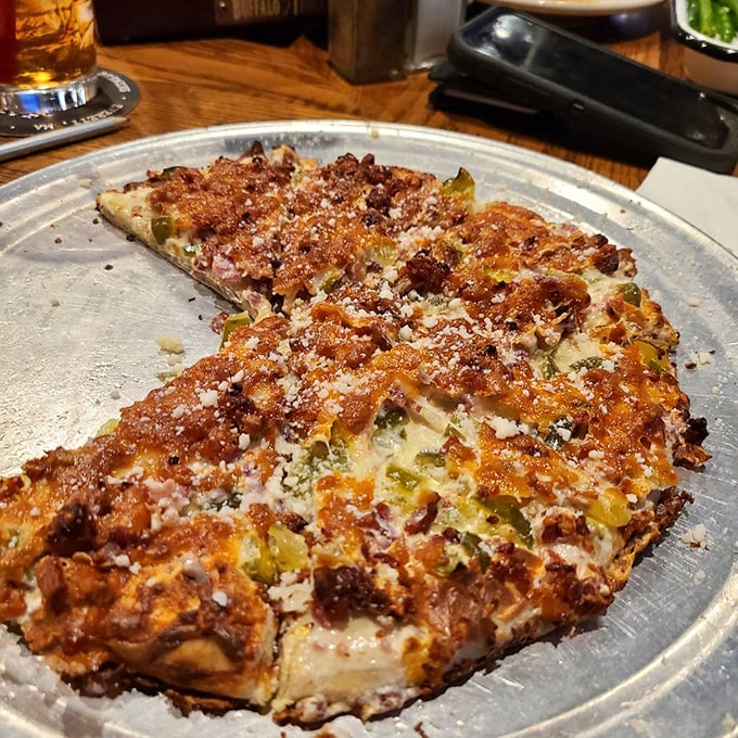 Even the pizza gets the barbecue treatment here, proving that smoke makes everything better—even Italian classics.