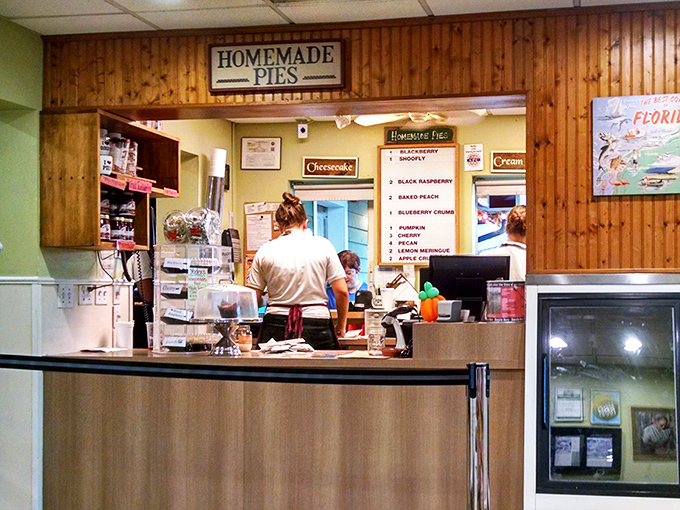 Behind the "Homemade Pies" counter, culinary magic happens daily. These aren't just bakers – they're happiness engineers with flour-dusted hands.