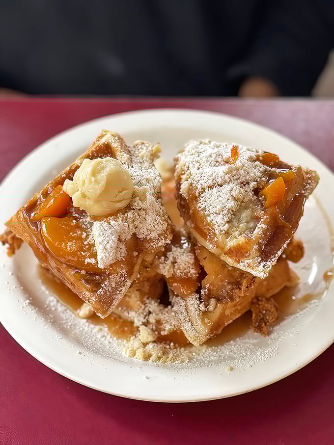 Chicken and waffles with a side of peach cobbler—the breakfast equivalent of having your cake and eating it too.