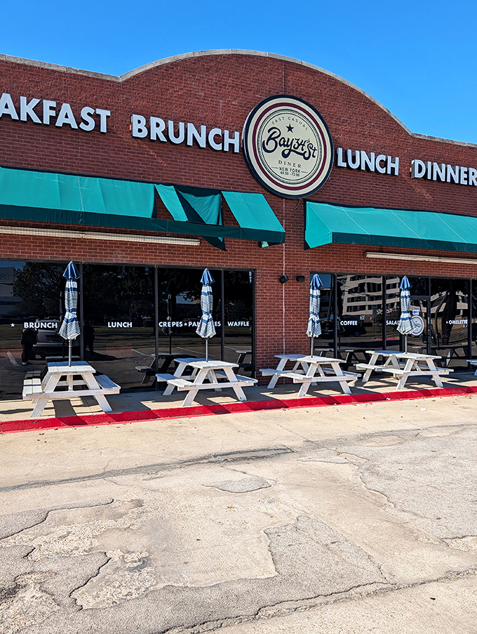 Those picnic tables aren't just outdoor seating—they're front-row tickets to the best breakfast theater in Arlington.