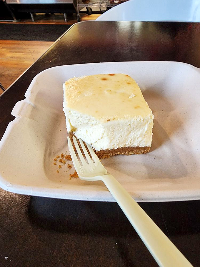 Cheesecake done right needs no embellishment—just a fork, a moment of silence, and the willpower not to order seconds.