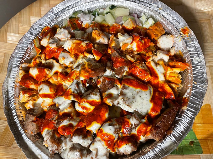 This isn't just a meal; it's a flavor festival in aluminum housing. Meat, sauce, cheese – the holy trinity of takeout excellence.