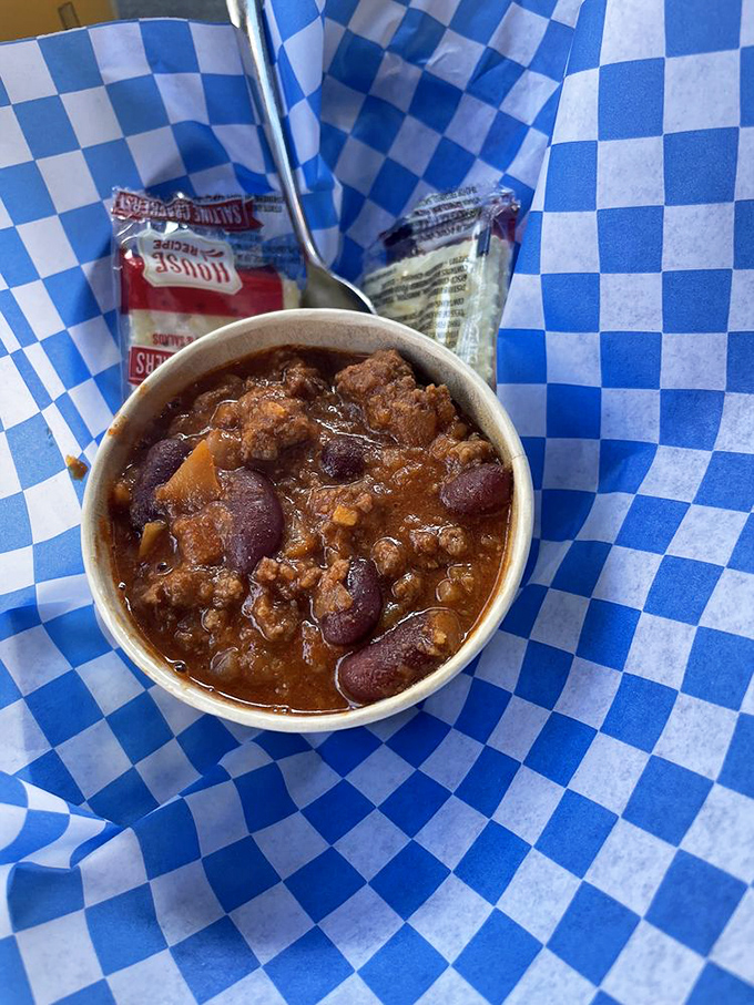 This isn't your average chili—it's a spicy, meaty revelation served in an unassuming cup. Don't let its humble appearance fool you. 