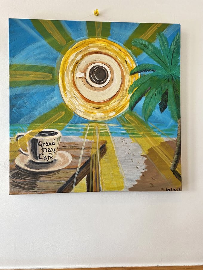 Whimsical sun artwork reminds you that even on cloudy Ohio days, it's always sunny inside Grand Day Cafe.