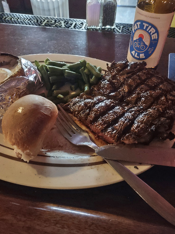 That steak isn't just resting beside that baked potato—it's posing for its Instagram moment, knowing full well it's the Brad Pitt of the plate.
