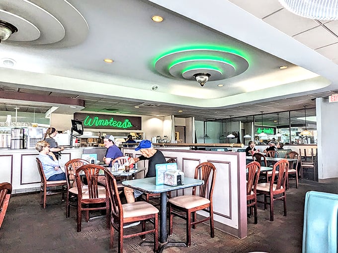 The dining room hums with stories being shared over steakburgers and shakes—each table its own little island of mealtime happiness.