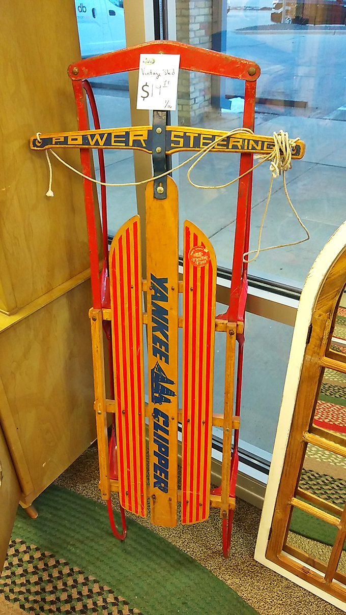 A vintage Flexible Flyer sled that's seen many Wisconsin winters stands ready for its next downhill adventure—nostalgia with runners attached.