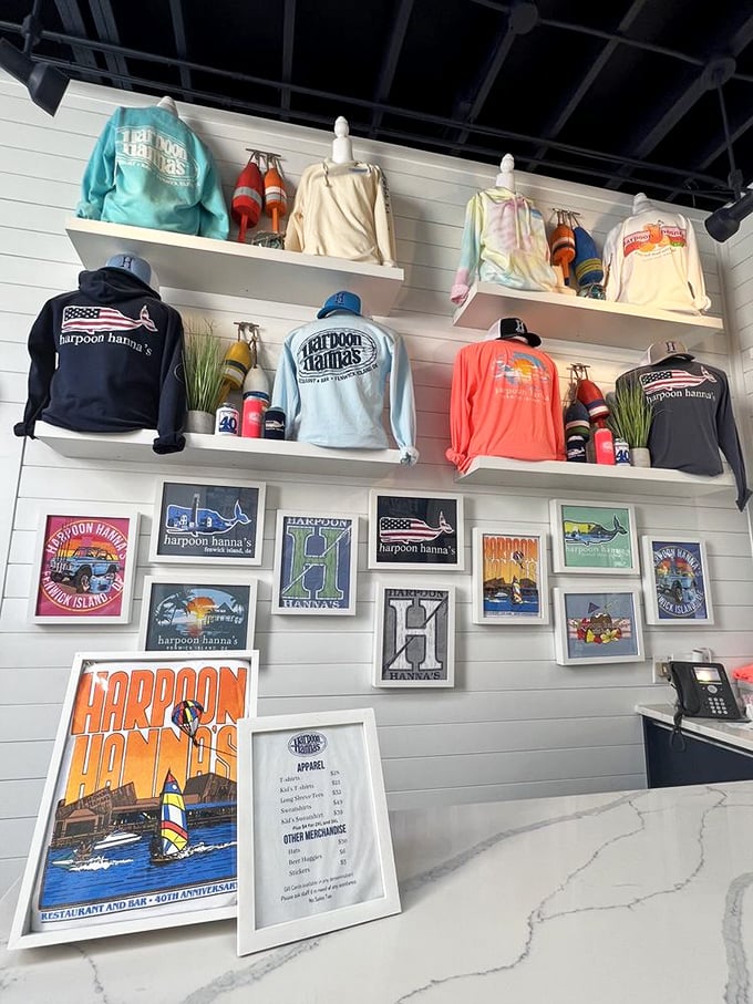The merch wall proves you're not just at a restaurant—you're at an institution worthy of wearing on a t-shirt.