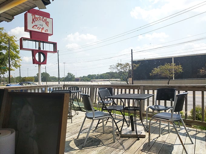 Even the outdoor seating carries that retro charm. The vintage sign stands tall, a beacon for hungry travelers seeking breakfast salvation.