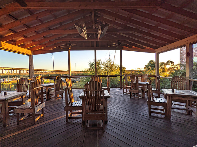 Sunset dining on the deck feels like you've stumbled into someone's carefully guarded secret spot—except everyone's invited to this party.