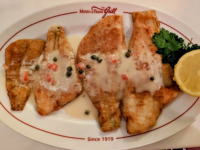 Sand dabs with lemon-caper sauce—a California classic that makes you wonder why more fish don't dress up this elegantly.