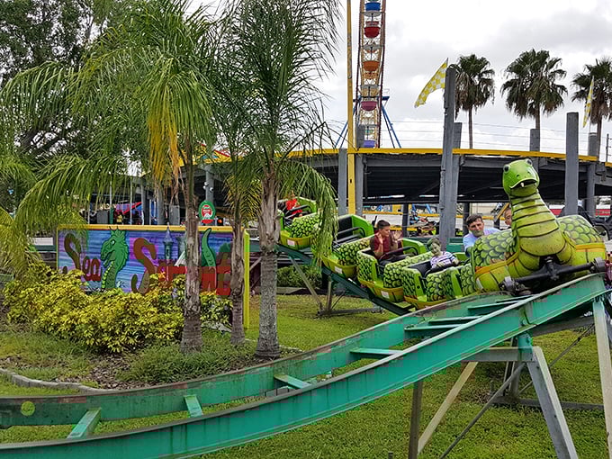 The sea serpent coaster delivers kid-friendly thrills with its colorful reptilian charm—the perfect "my first roller coaster" experience for budding thrill-seekers.